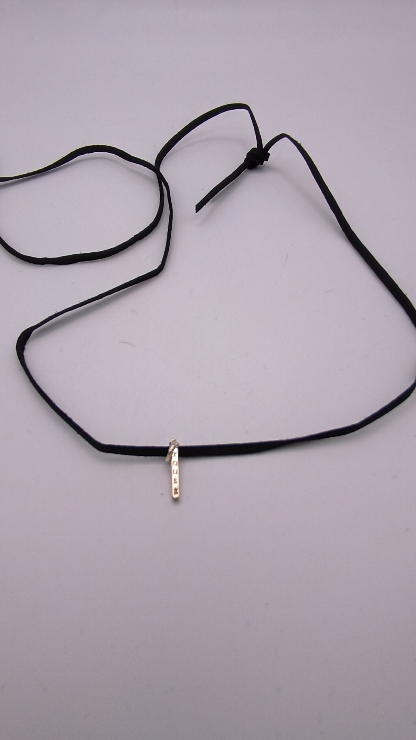 COLGANTE TOUS LINGOTE CUERDA NEGRA | Real Cash